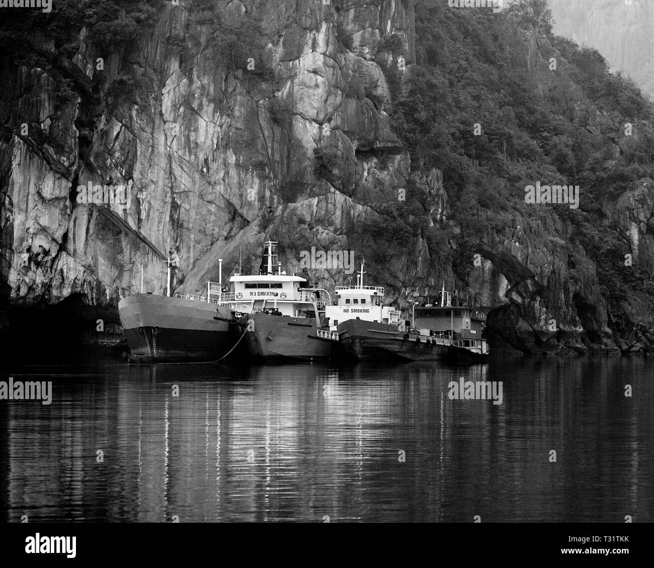 Ferry boat on floating Black and White Stock Photos & Images - Alamy