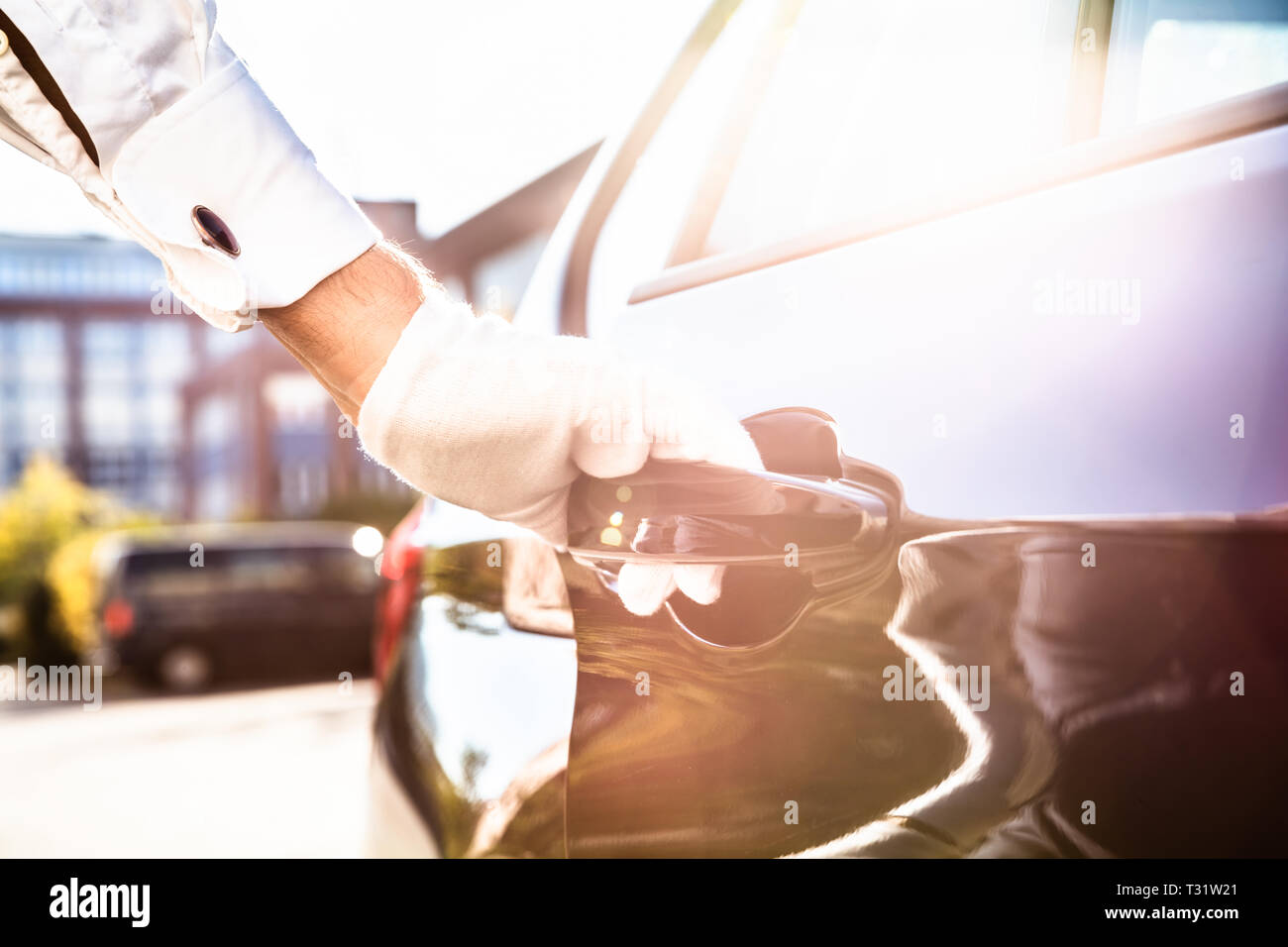 Car door open valet hi-res stock photography and images - Alamy