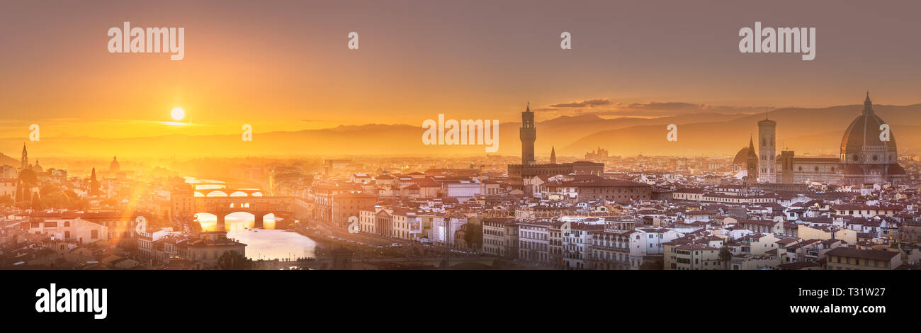 Panoramic aerial view of Florence during sunset with sun rays from ...