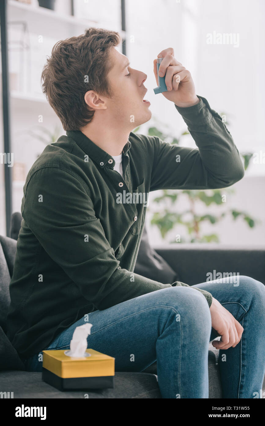 Man using inhaler hi-res stock photography and images - Alamy