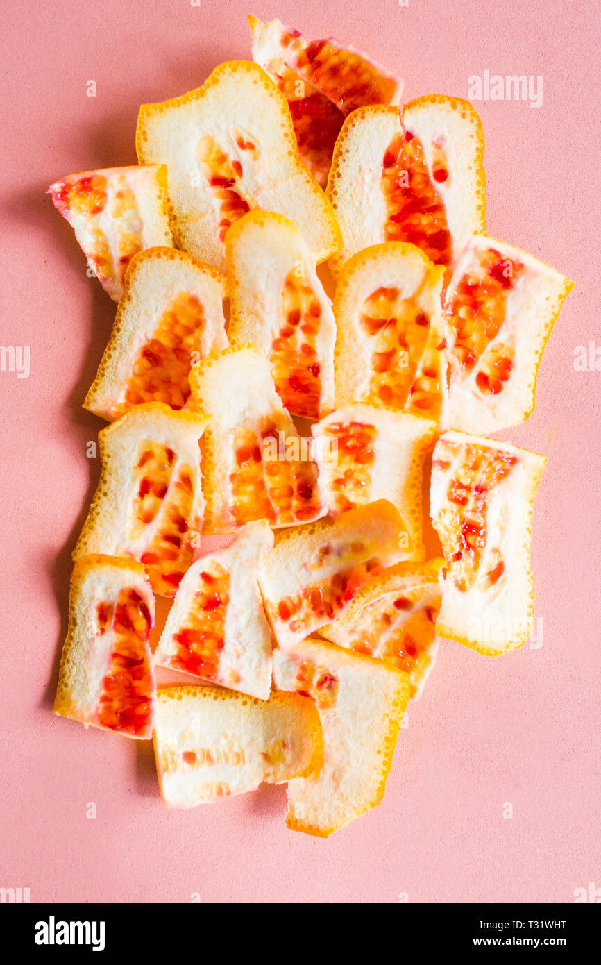 colorful orange rind isolated on pink background Stock Photo - Alamy