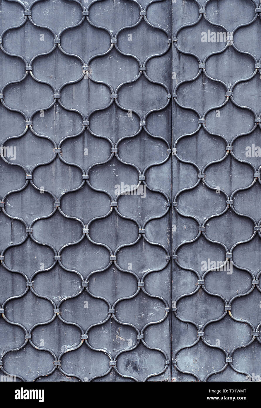 Pattern of forged waved metal rod on steel sheet. Door texture Stock ...