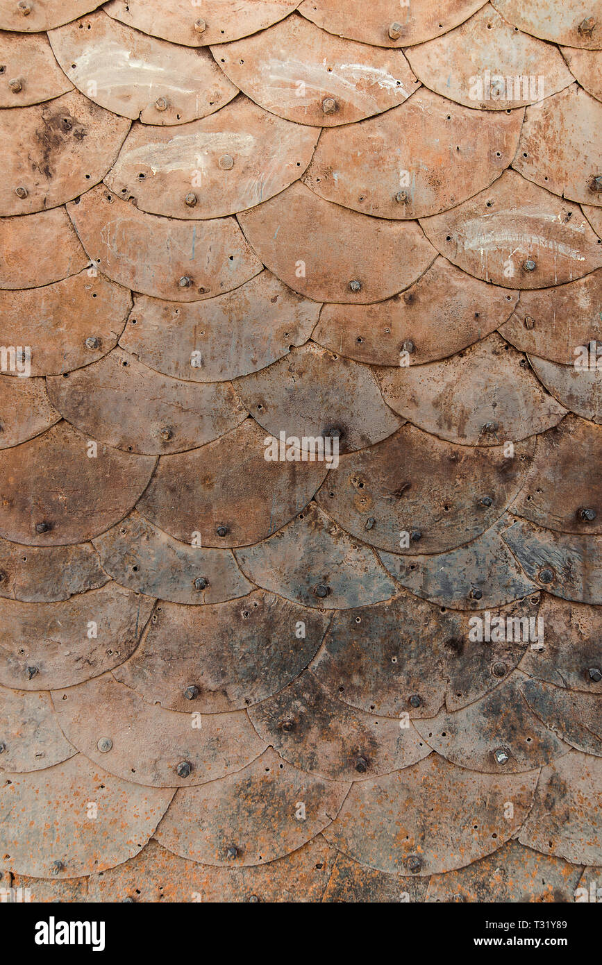 Texture of encient gate from rusty metal round plates with rust ...