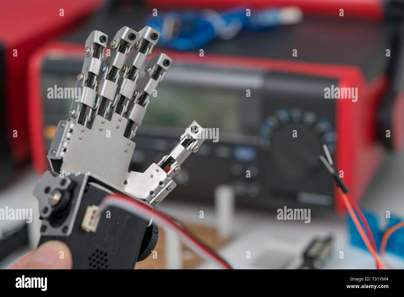 Mechanical model of human palm. Robot arm Stock Photo - Alamy