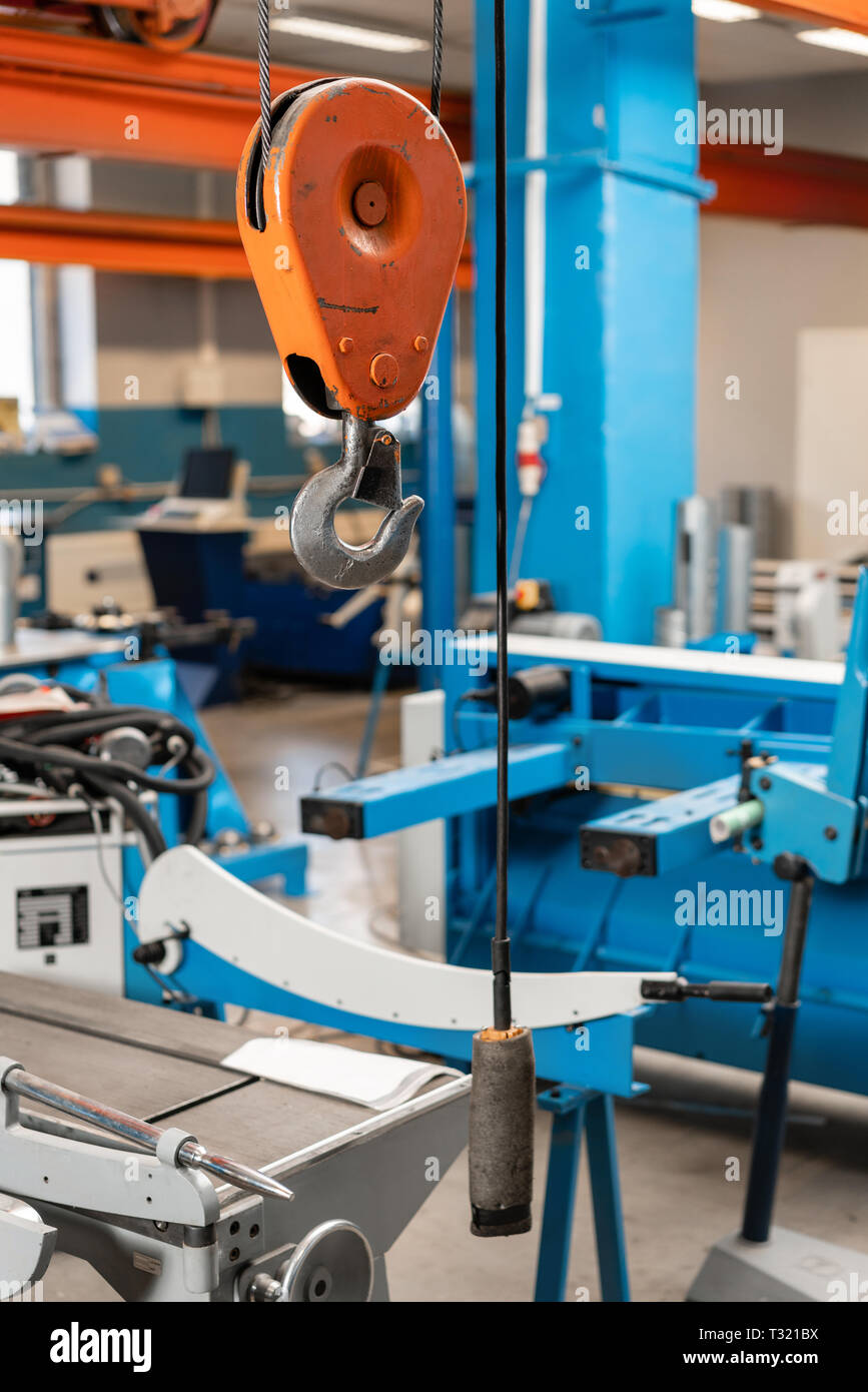 Crane hook. The system of pulleys and ropes, a hanging mechanism in the ...