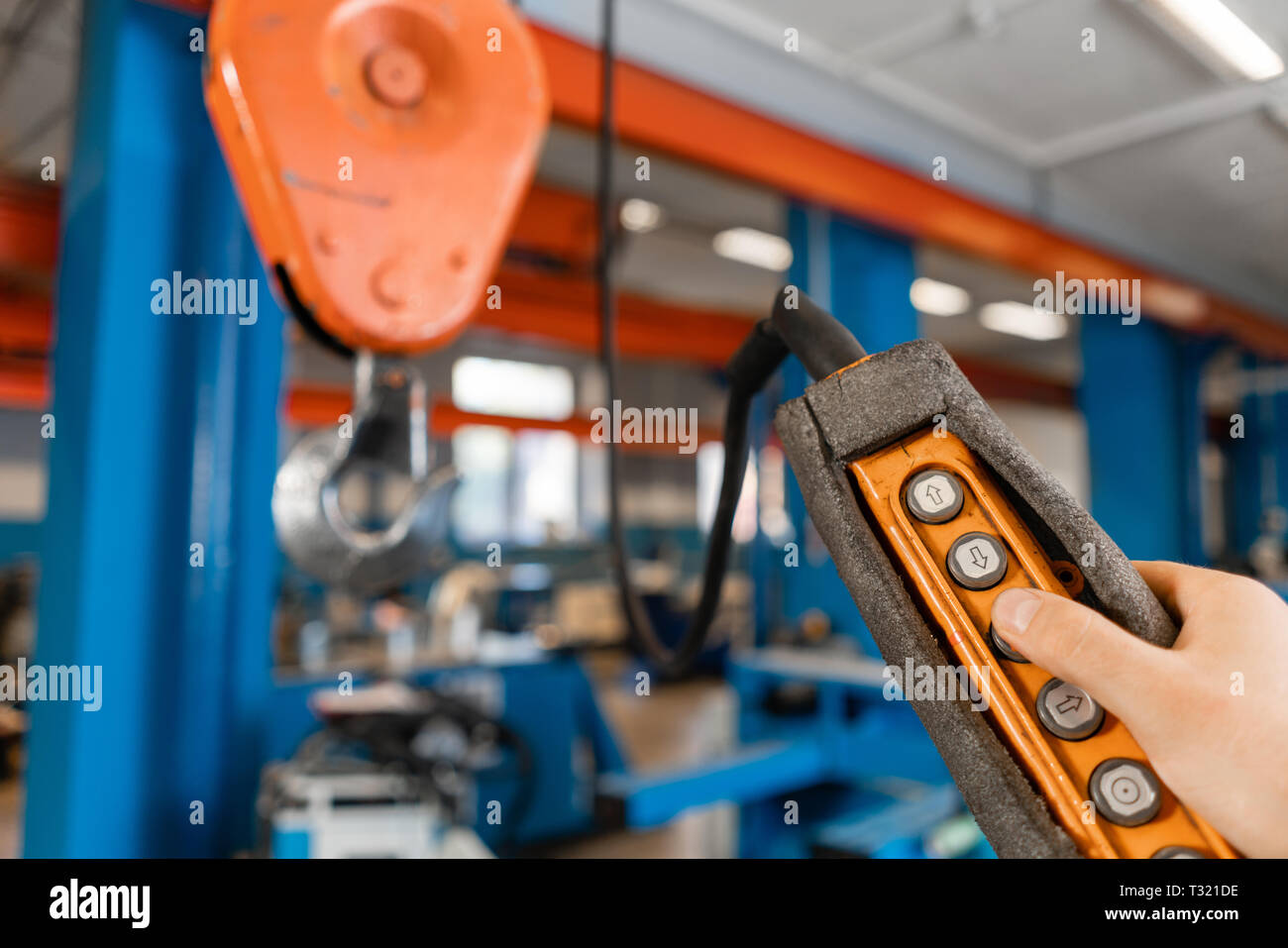 Crane hook. The system of pulleys and ropes, a hanging mechanism in the ...