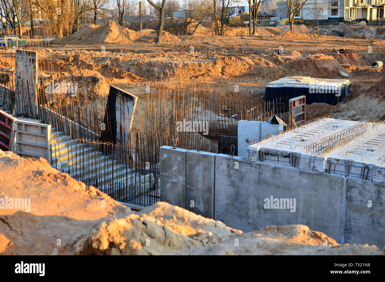Monolithic concrete structure in the foundation pit during the construction of a new underground ...