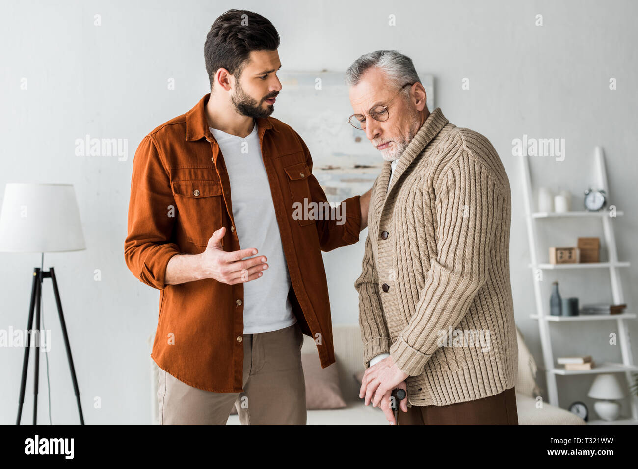 Two sad looking men hi-res stock photography and images - Alamy