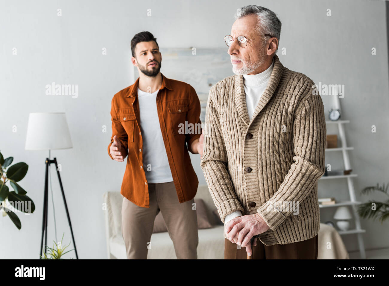 Two sad looking men hi-res stock photography and images - Alamy