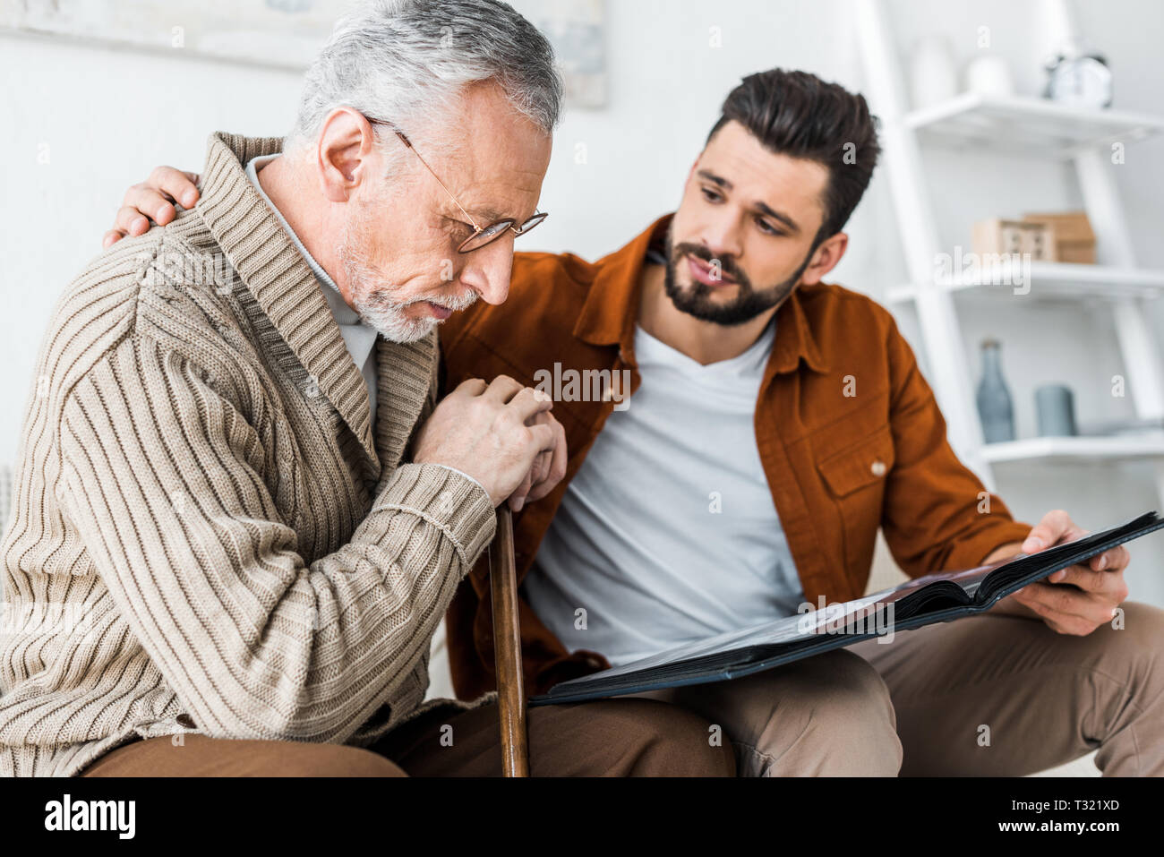 Sad photo album hi-res stock photography and images - Alamy