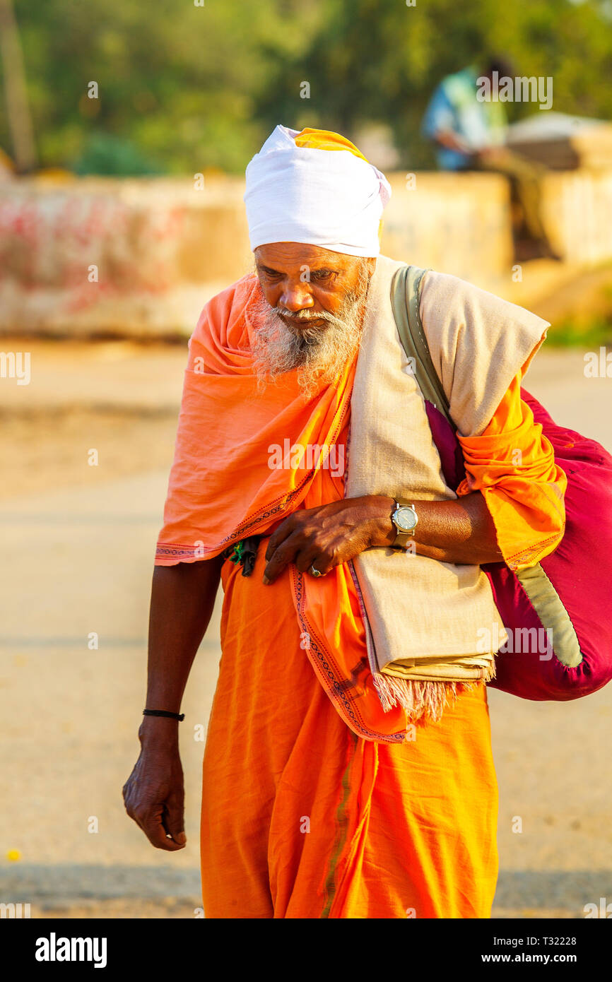 Old indian man in traditional clothes at Hospet town, Karnataka, India ...