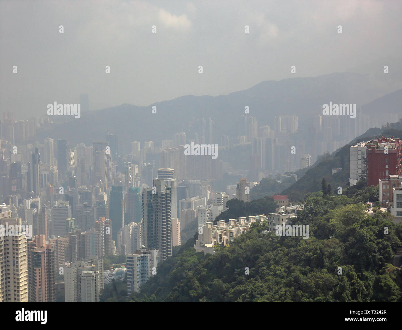 Hong Kong skyscrapers on smoggy day Stock Photo - Alamy