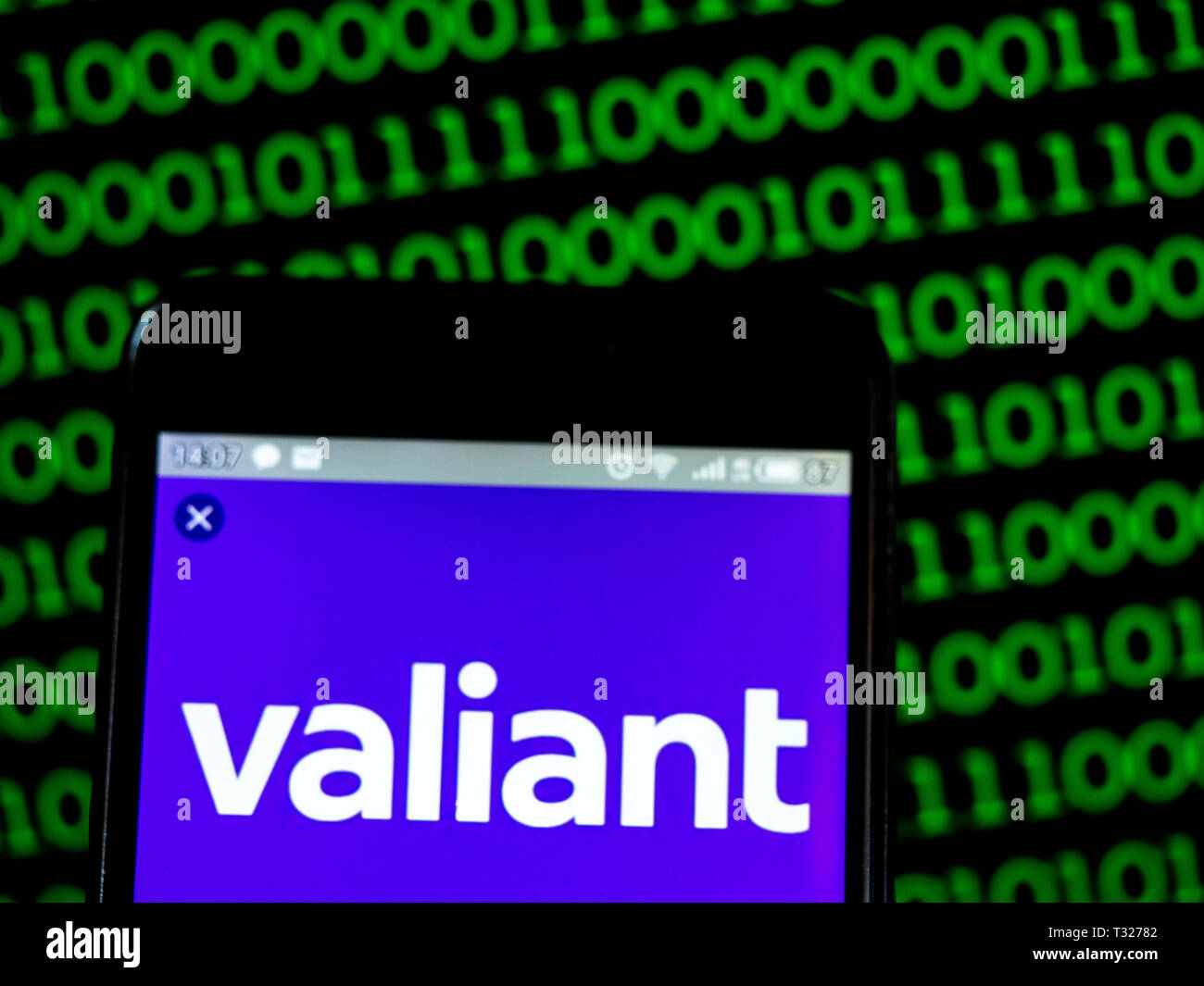 In this photo illustration a Valiant Bank logo seen displayed on a ...