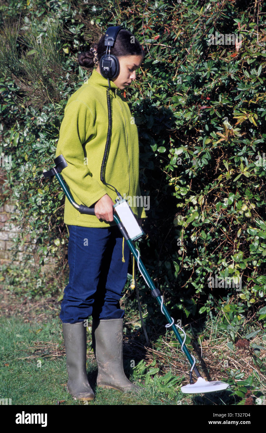 girl with metal detector Stock Photo - Alamy