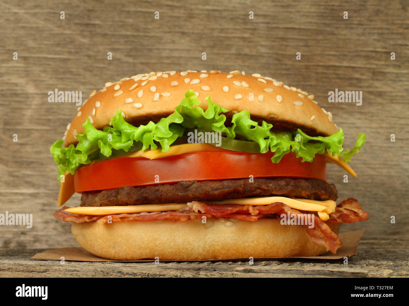 Big hamburger on brown hi-res stock photography and images - Alamy