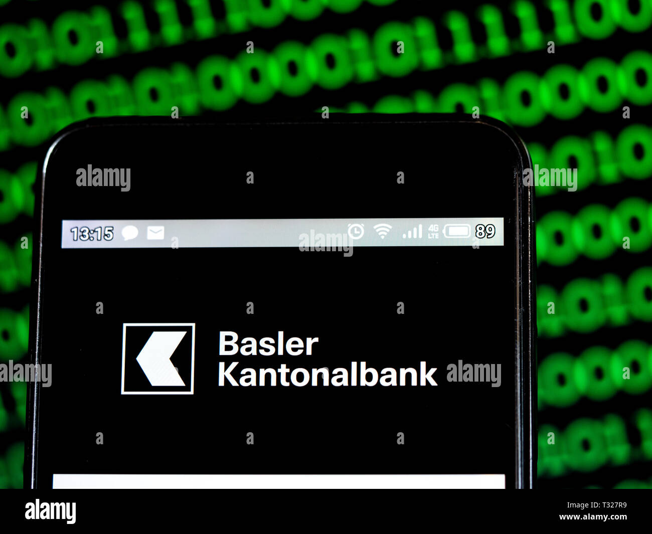 In this photo illustration a Basler Kantonalbank logo seen displayed on ...