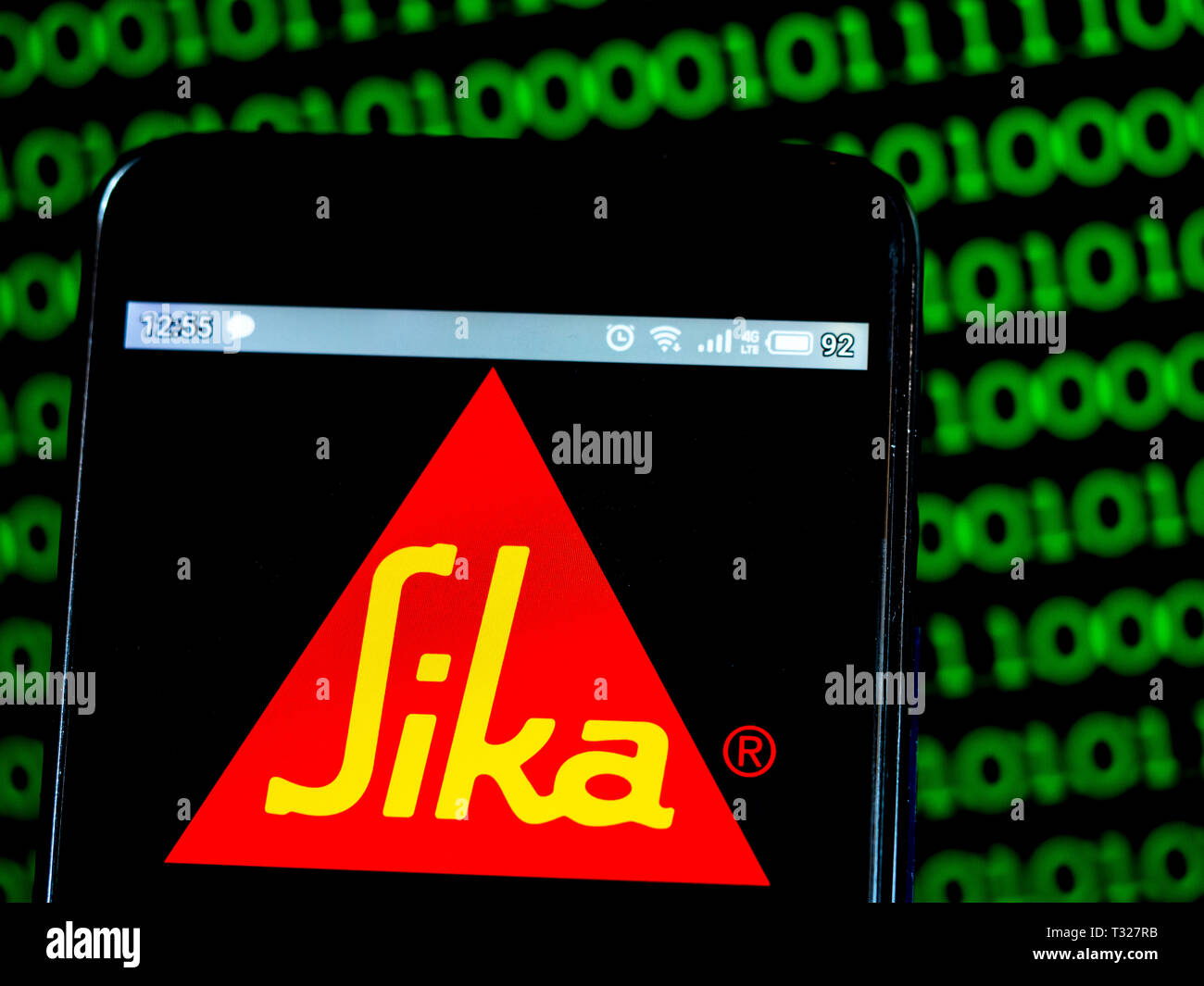 In this photo illustration a Sika AG logo seen displayed on a smart ...