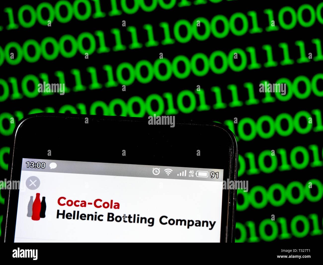 In this photo illustration a Coca-Cola HBC AG logo seen displayed on a ...