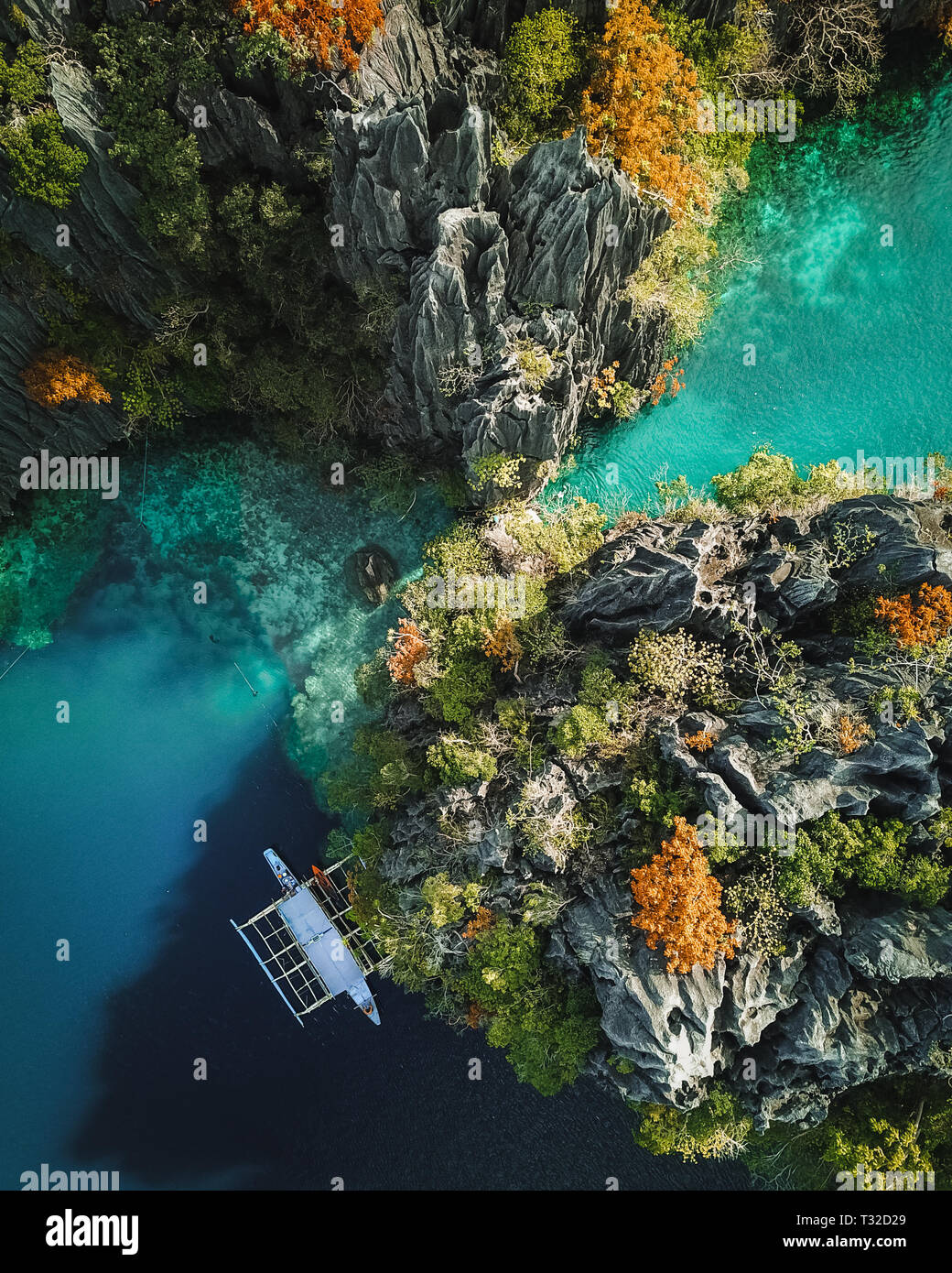 A top down aerial view of the Twin Lagoon in Coron, Philippines, with a ...