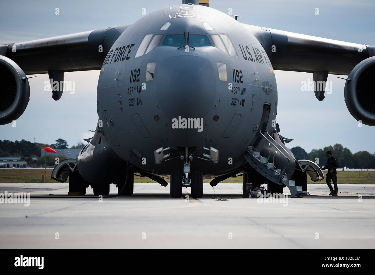 Lt Col Jason Williams, right, a C-17 Globemaster III pilot assigned to ...