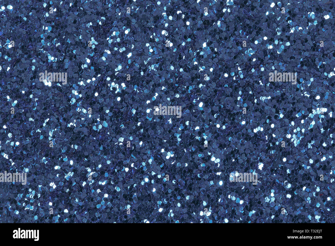 Texture from blue glitter. Low contrast photo Stock Photo - Alamy