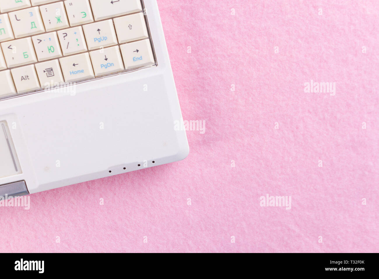 computer on pink background with copy space Stock Photo - Alamy