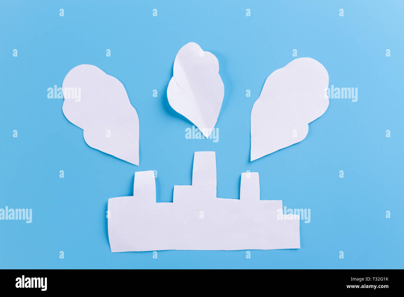 paper factory on blue background. environmental pollution concept Stock ...