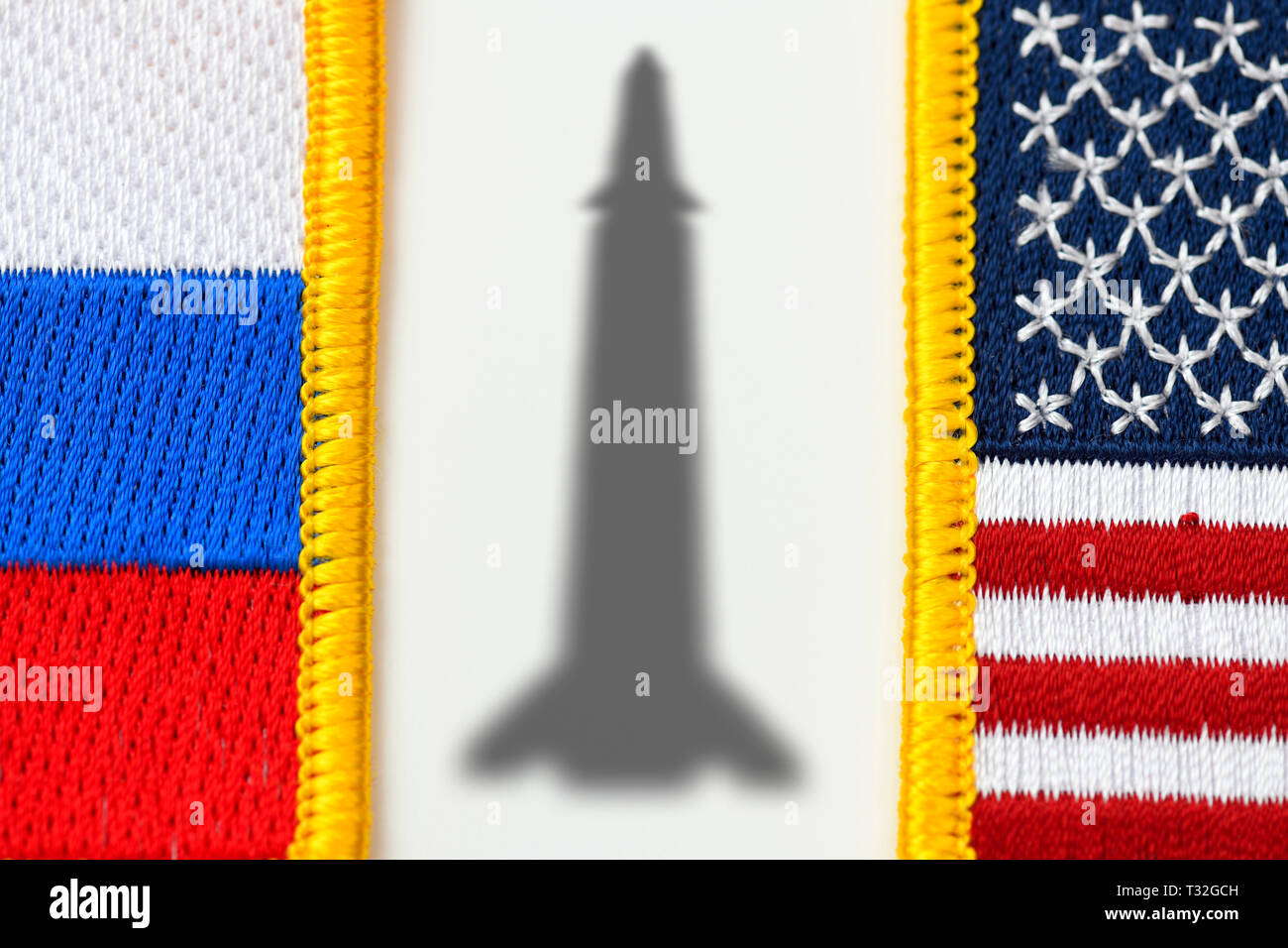 Flags of the USA and Russia and shade of a march missile, the USA ...
