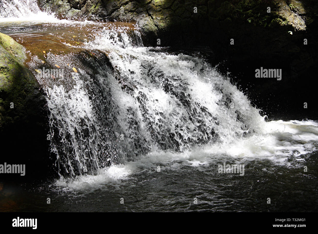 Close up of the bottom of a multi level waterfall in Hawaii, USA Stock ...