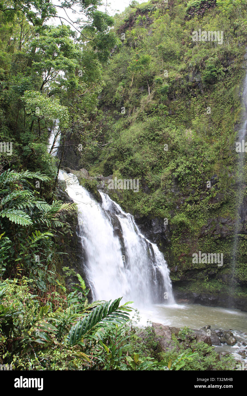 Three Bears Falls, also known as Upper Waikani Falls, cascading down a ...