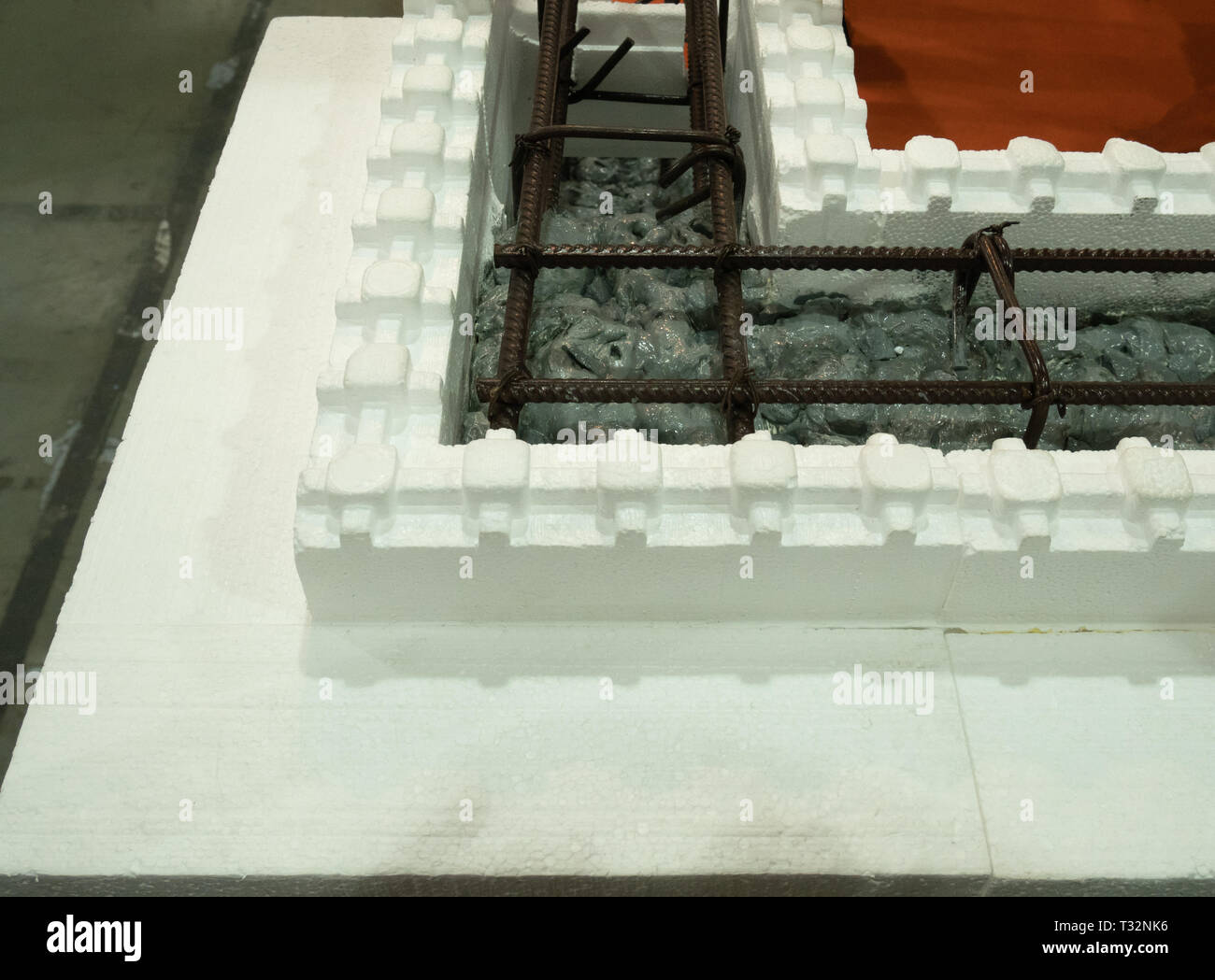 construction frame with insulating styrofoam and reinforced concrete ...