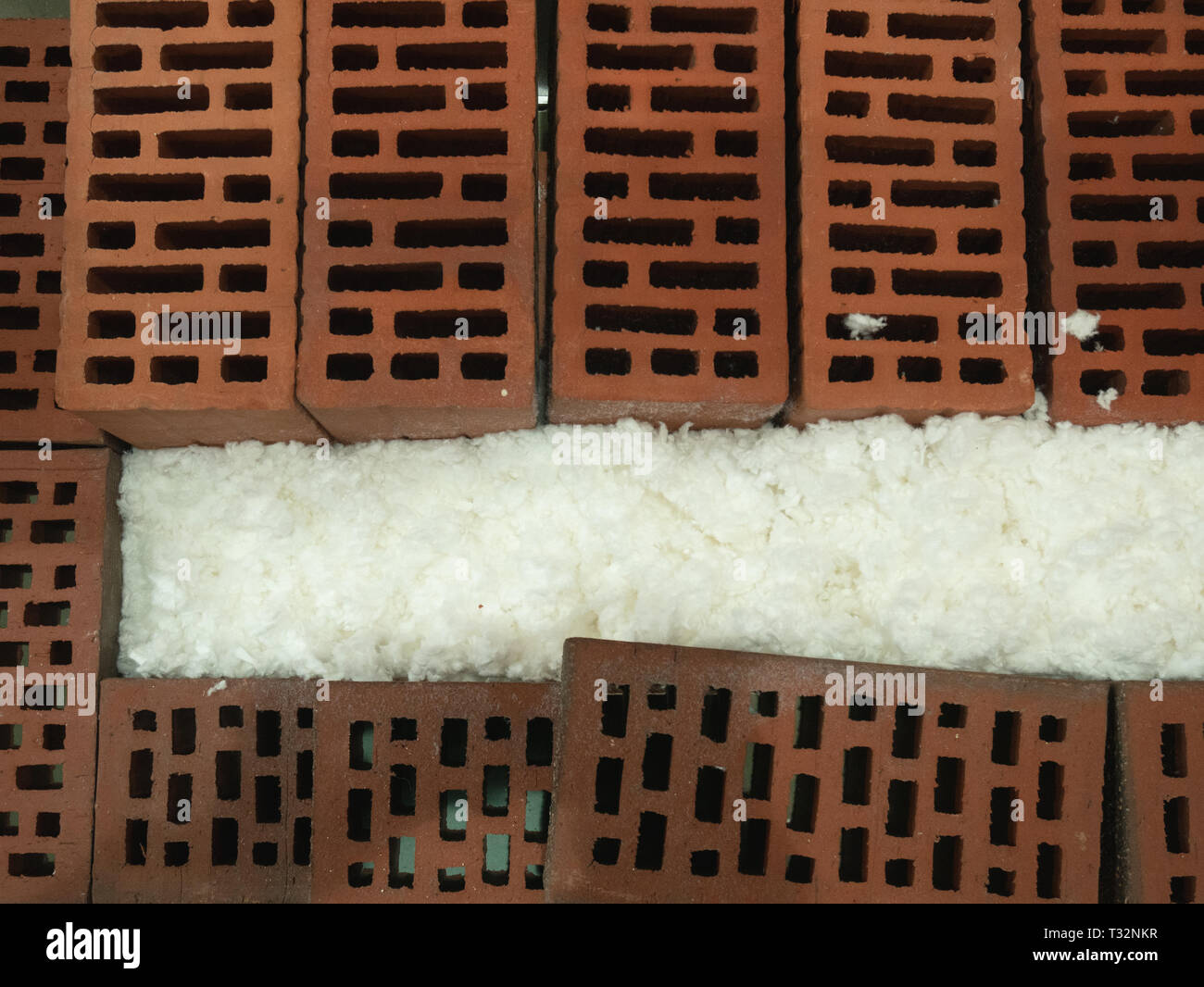 modern building wall cut - hollow bricks and fiber mineral wool for ...