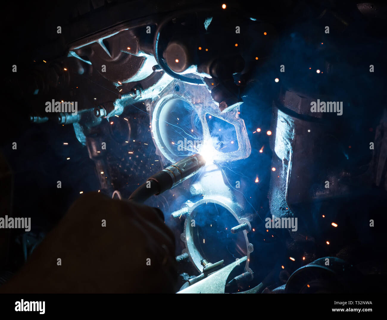 Welding work on a car engine close-up Stock Photo - Alamy