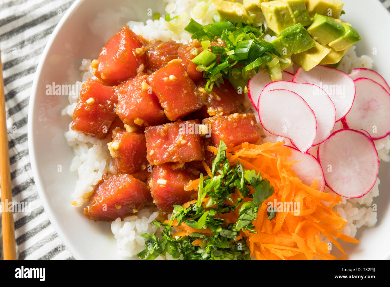 Homemade Ahi Tuna Poke Bowl with Rice and Vegetables Stock Photo - Alamy