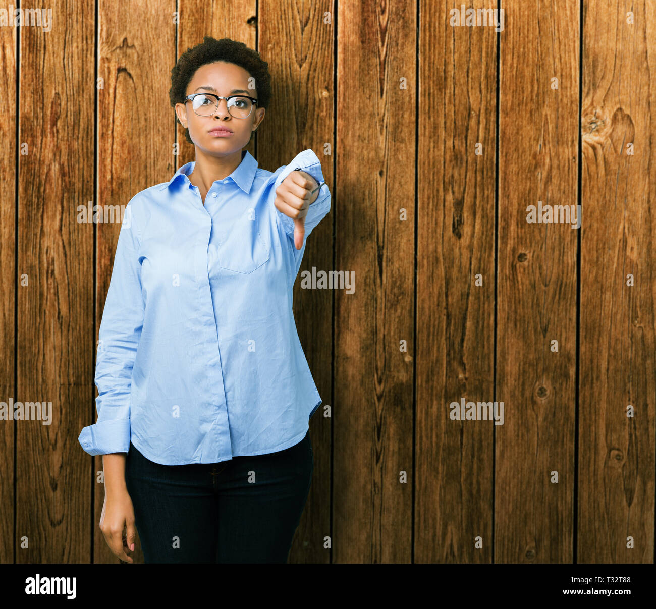 Young beautiful african american business woman over isolated ...