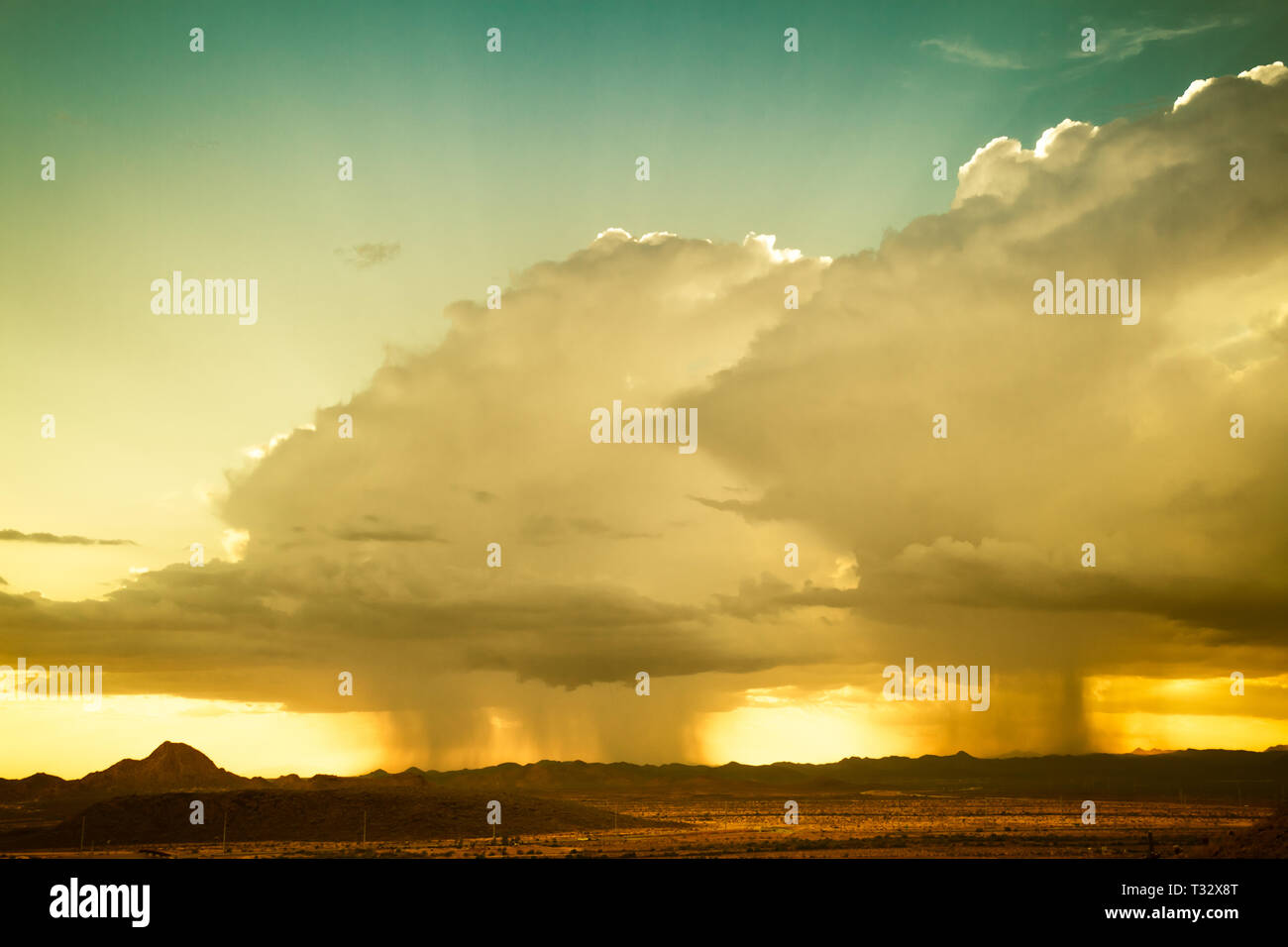 A monsoon storm over the desert of Arizona during sunset Stock Photo ...