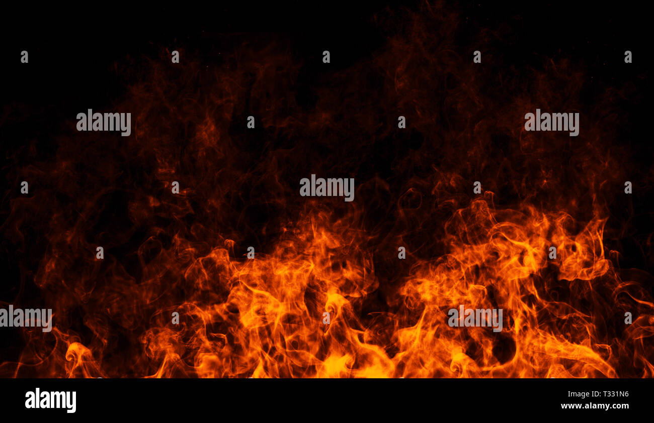 Fire flames texture on isolated black background. Perfect texture ...