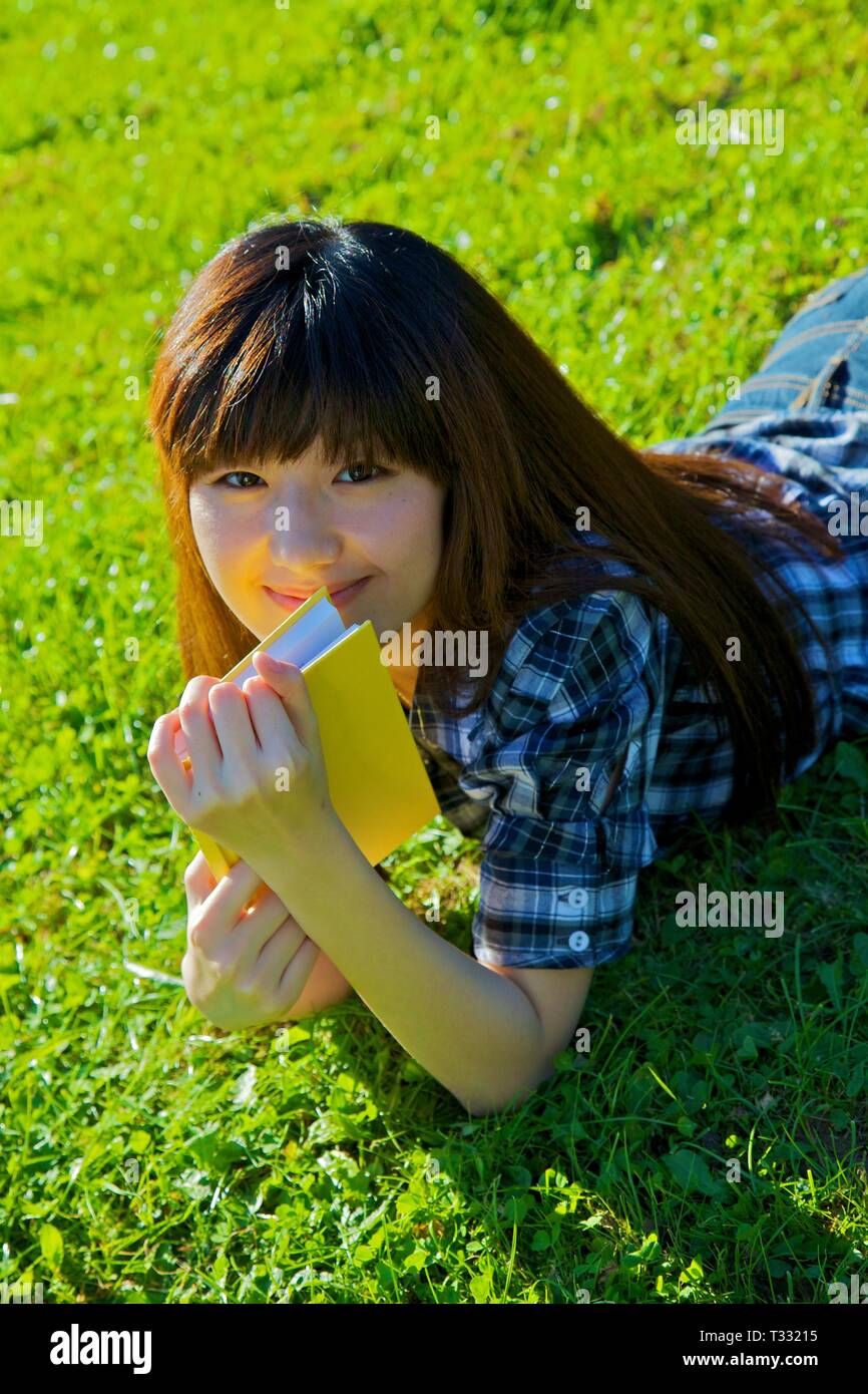 Asian Female Student Studying Stock Photo - Alamy