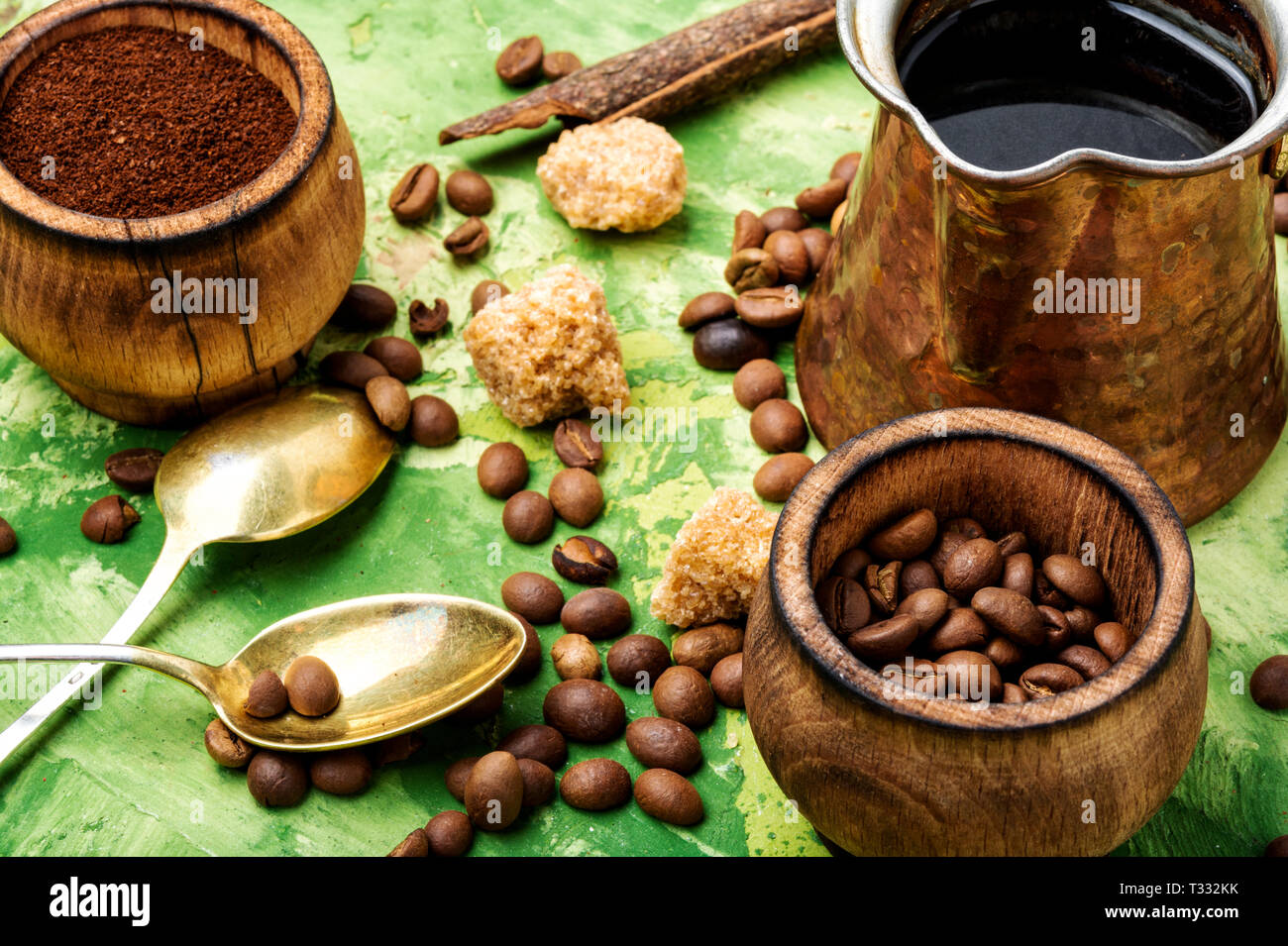 Milled coffee powder with beans.Coffee beans and ground coffee Stock ...