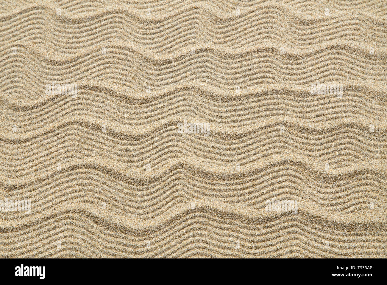 Wave sand pattern texture as background Stock Photo - Alamy