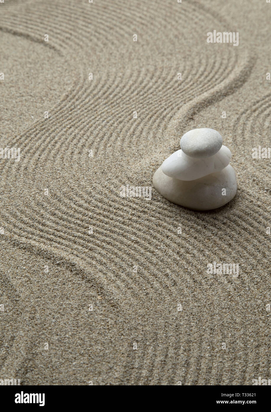 Zen garden with the stack of rocks Stock Photo - Alamy