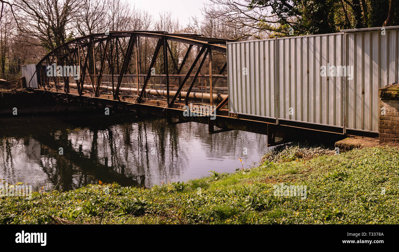 Closed bridge over a river Stock Photo - Alamy