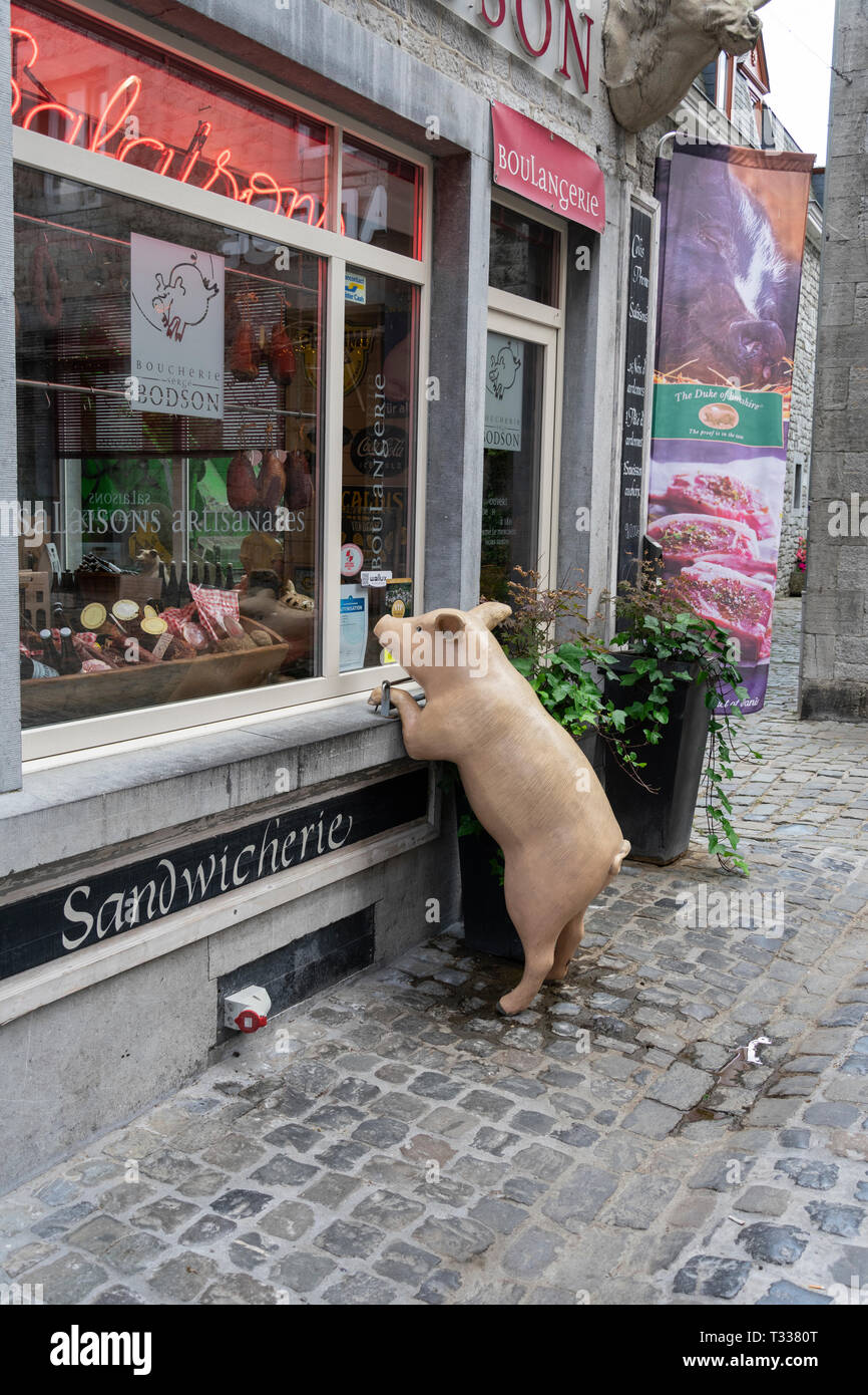 Durbuy, Belgium - july 24, 2018 pig stands for the window of a butcher ...
