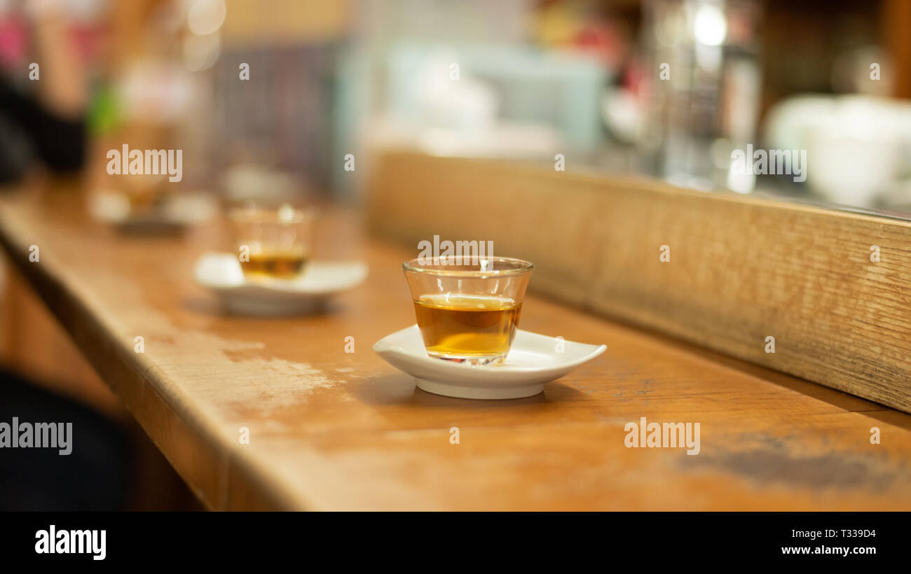 Chinese tea ceremony, people drink tea at the store Stock Photo - Alamy