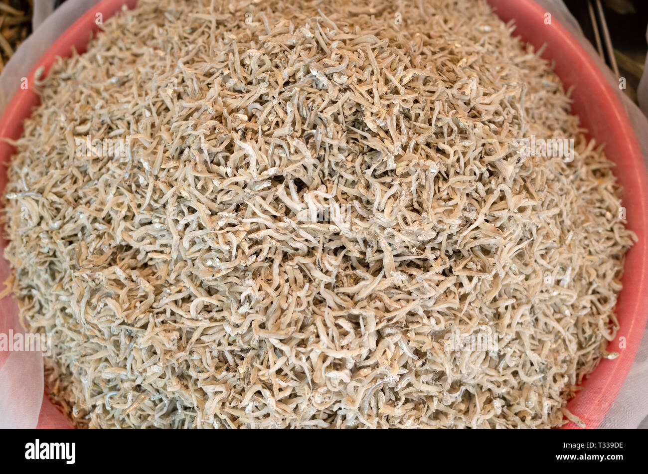 heap of dried anchovies fish at the traditional market Stock Photo - Alamy