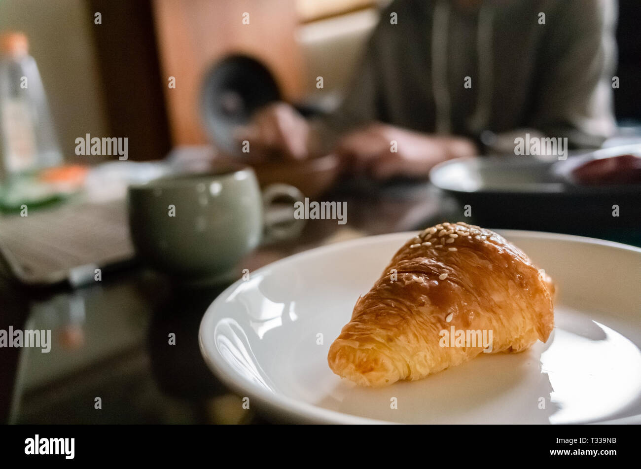 afternoon snacks of croissant on a dish at table Stock Photo - Alamy