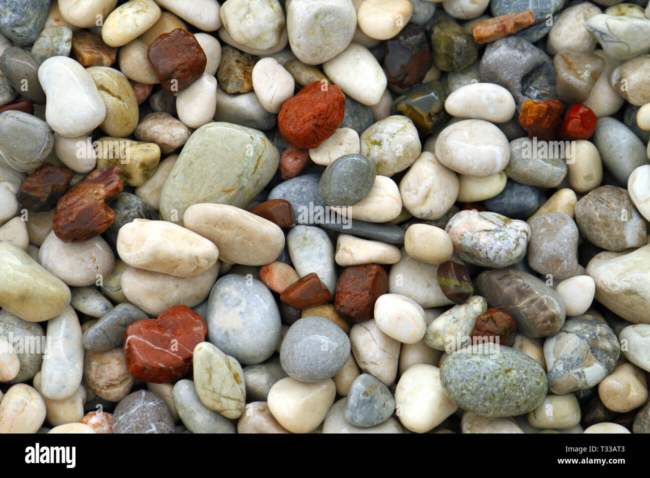 background with sea wet pebble stones Stock Photo - Alamy