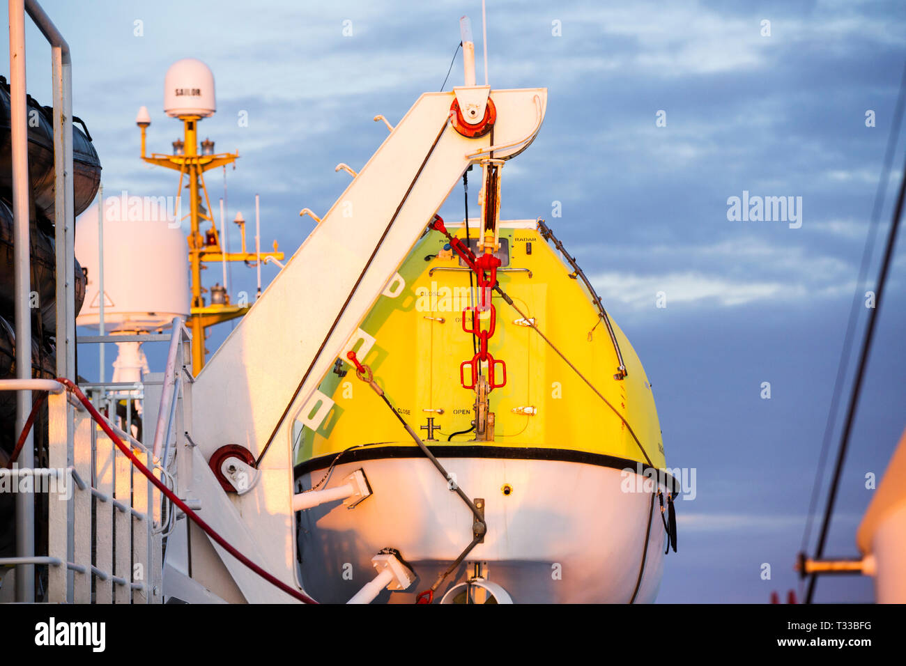 Lifeboat on an Antarctic cruise ship glowing in the late evening sun ...