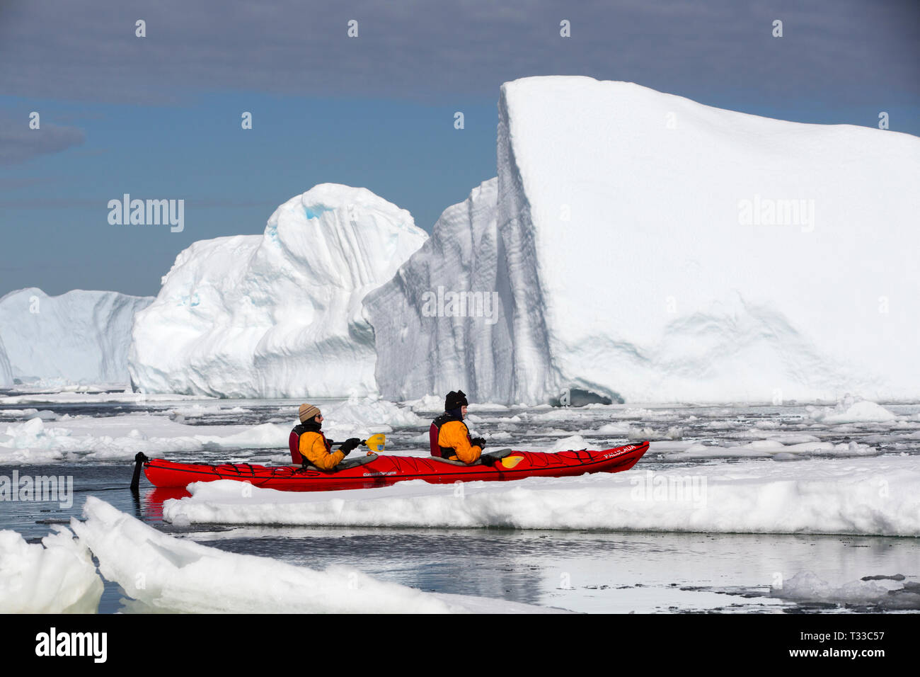 Sea Kayaks with tourists from an Antarctic cruise ship in the Lemaire ...