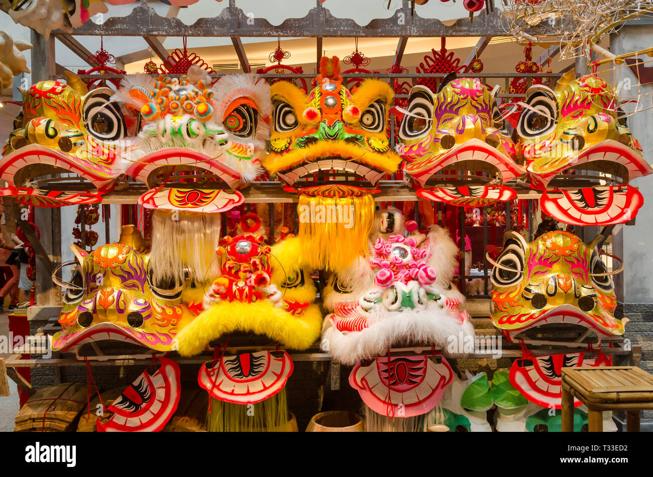Traditional chinese lion dance head display on the shelves Stock Photo ...